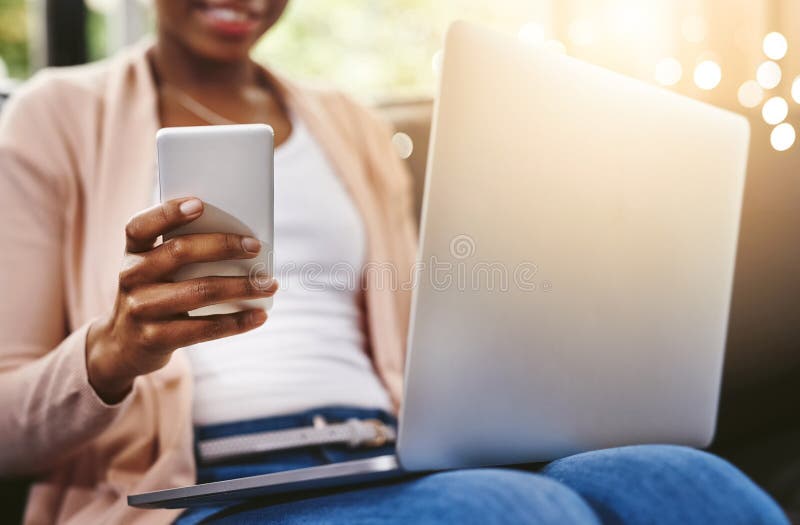 Shes always Connected. an Unrecognizable Young Woman Using Laptop while ...