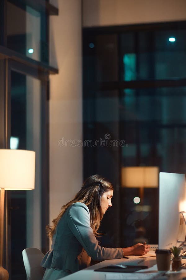 Shes the Epitome of Career Dedication. a Young Businesswoman Using a ...