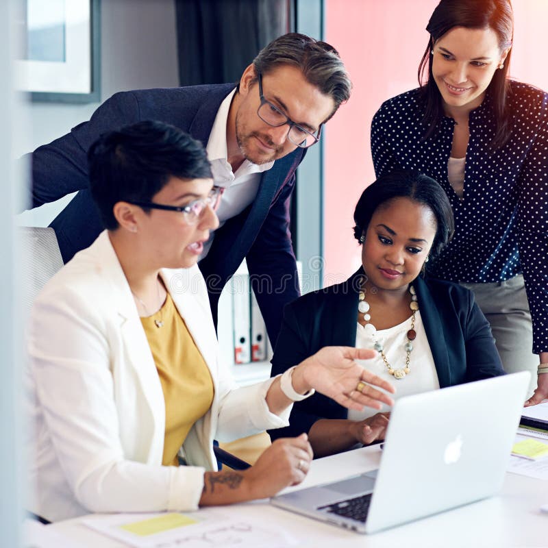 Shes Explaining Her Process. Four Business Colleagues Working in the ...