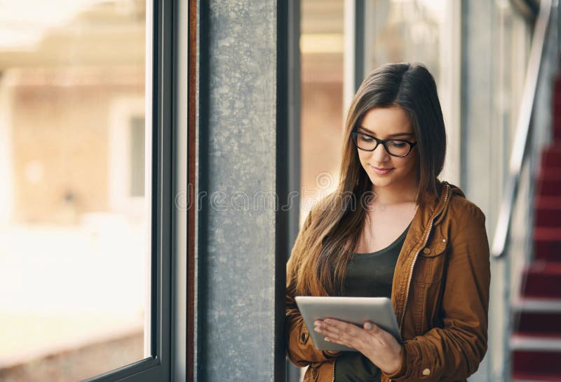 Shes Got All the Study Notes on Her Tablet. an Attractive Young ...