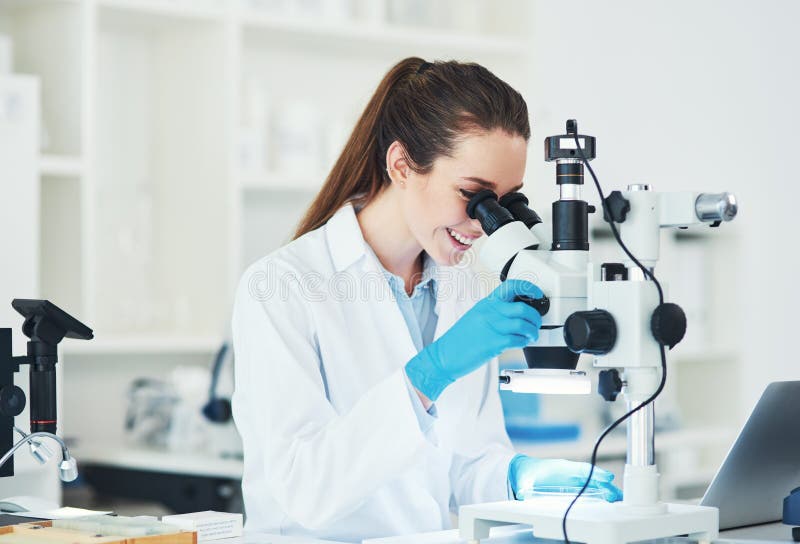 Shes Having a Great Time. a Focused Young Female Scientist Looking ...