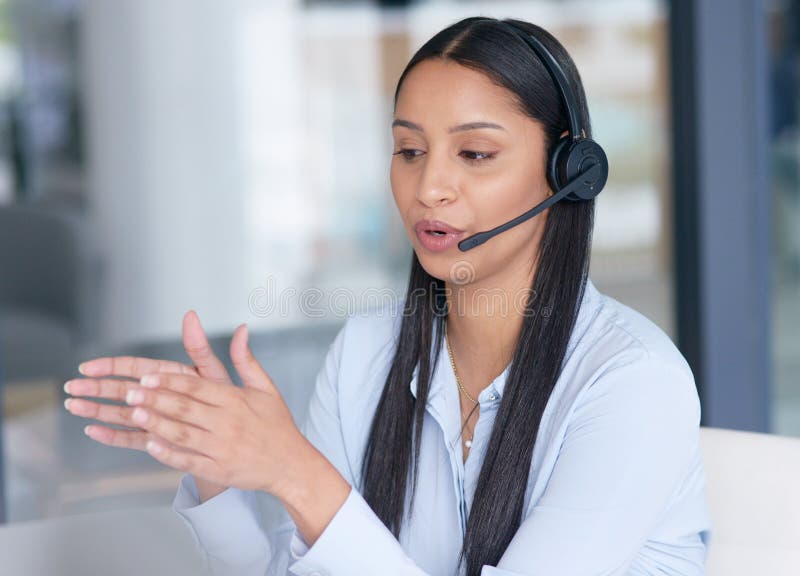 Shes a Master Problem-solver. Shot of a Young Call Centre Agent Working ...