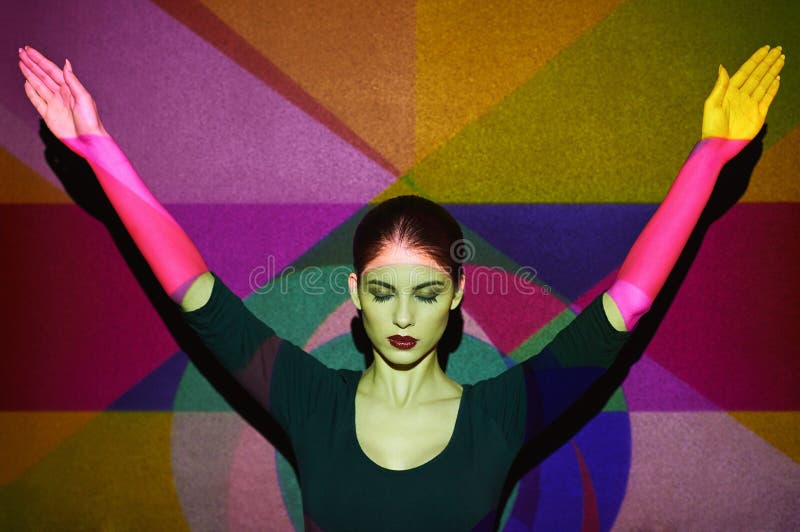 Shes the Queen of Color. a Beautiful Model in the Studio Covered with a ...