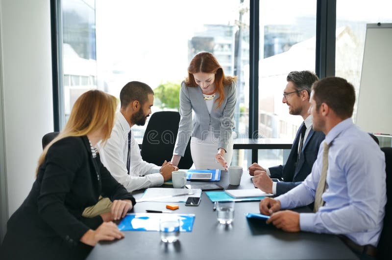 Shes Taking the Lead. Businesspeople in a Meeting. Stock Photo - Image ...