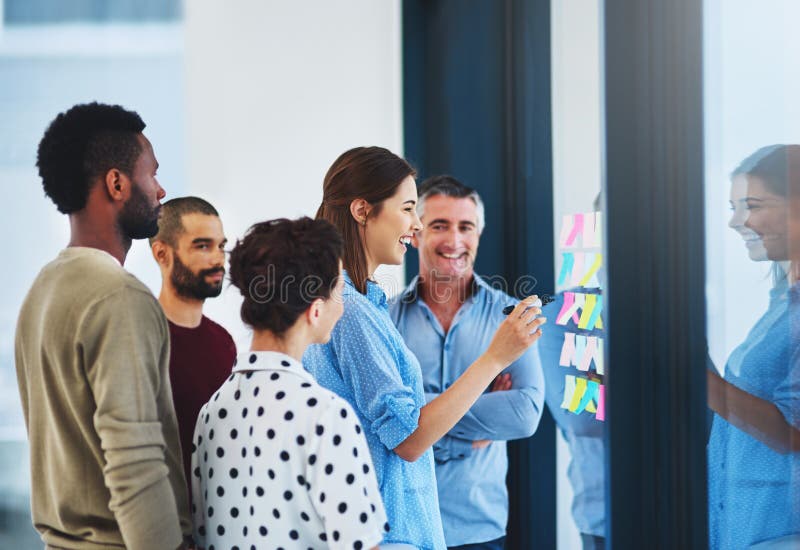 Shes Taking the Lead on this Project. a Group of Businesspeople Working ...