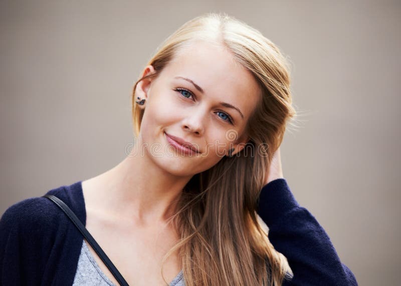 Shes A True Beauty Cropped Portrait Of A Beautiful Young Woman Stock