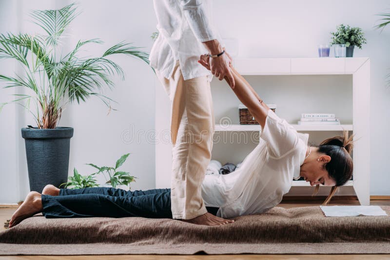 Shiatsu Back Stretch stock image. Image of massaging - 325073475
