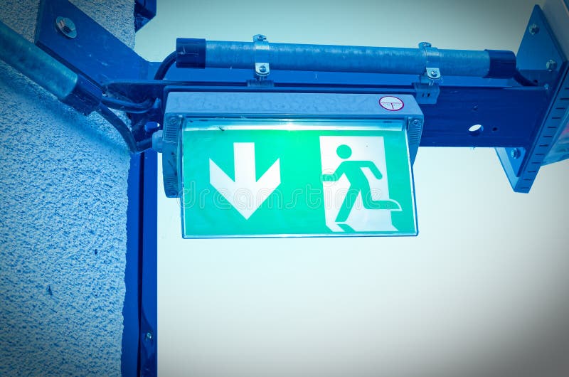 Shield with Emergency Exit and Exit Symbol in Blue Optics Stock Image ...