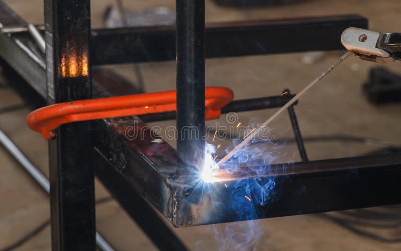 Shield Metal Arc Welding Welding and C-clamp. Stock Image - Image of ...