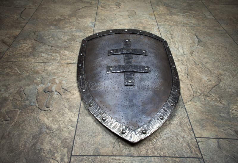 Shield on stone floor stock photo. Image of armed, barbarian - 66782282