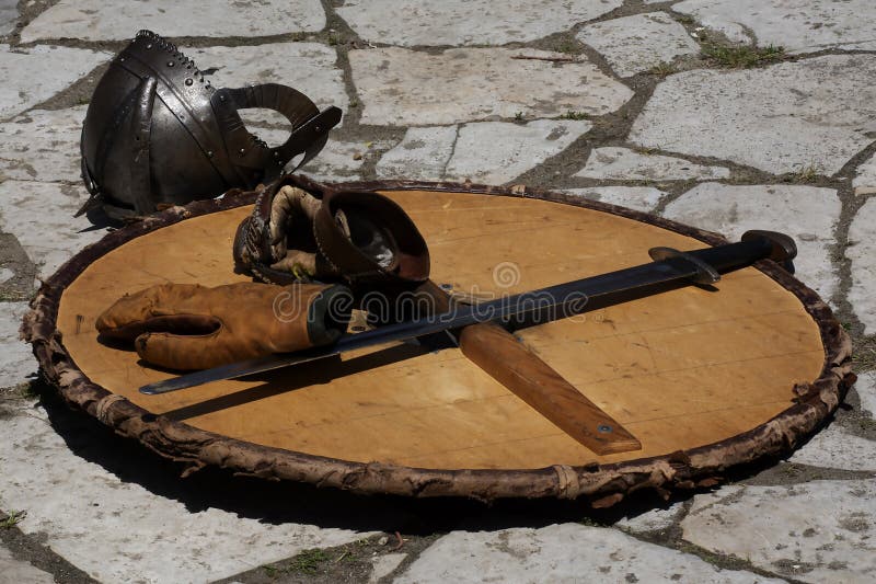 Shield and sword stock image. Image of brown, shield - 319783887