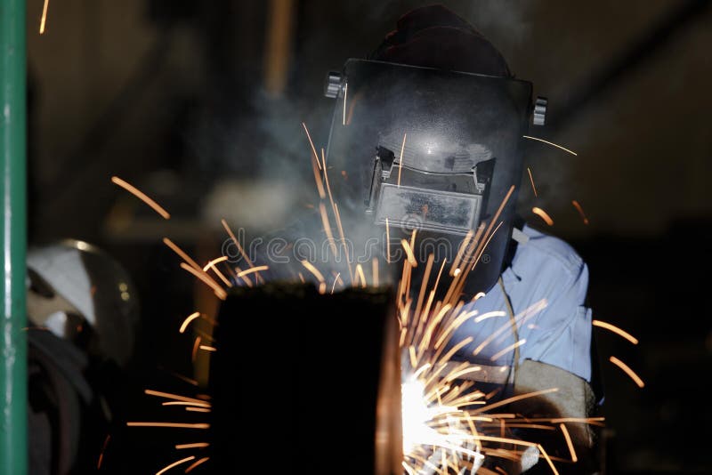 Shielded metal arc welding stock photo. Image of repair - 63881574