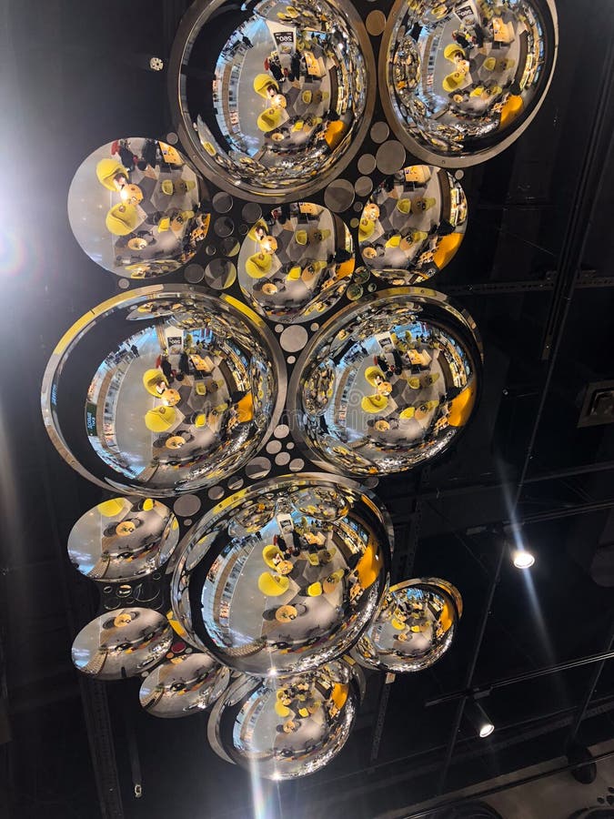 Shimmering Reflections from Spherical Mirrors on a Modern Ceiling ...