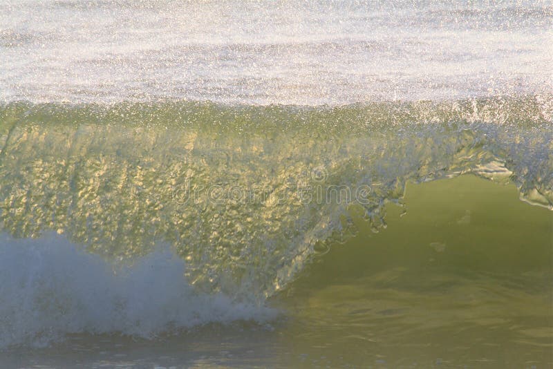 Translucent waves of dawn stock photo. Image of ocean - 115967826