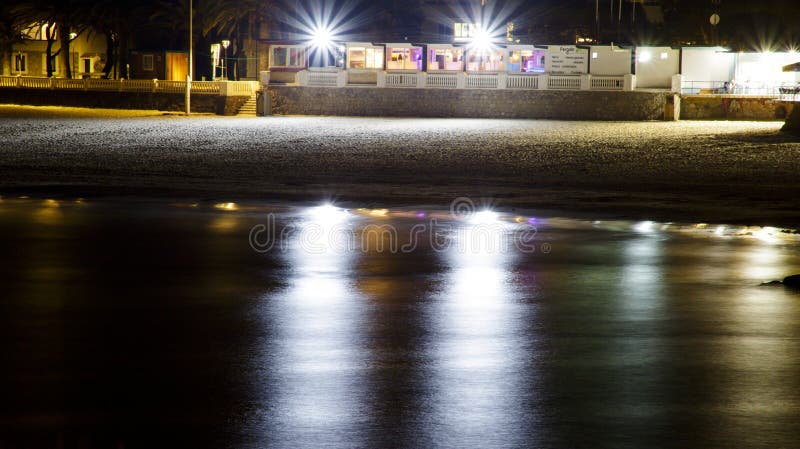 The Shine of the Lights on the Beach Stock Photo - Image of beach ...