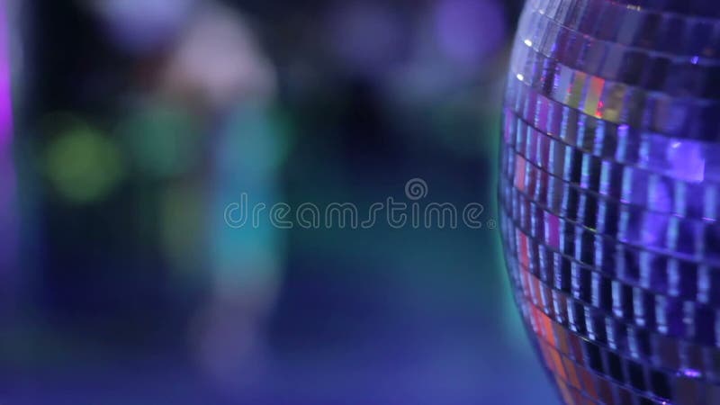 Shining Disco Ball Spinning in Strobe Light with Dancing People Stock ...
