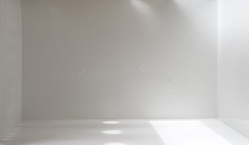 Shining Light and Shadow Images in a White Room with Space Stock Image ...