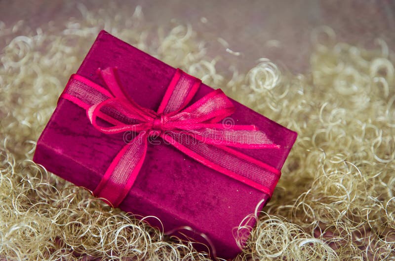 Shining Red Christmas Box with Surprise Inside in Golden Background ...