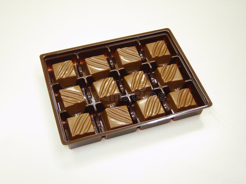 Square box of chocolates. stock photo. Image of assortment - 83907568