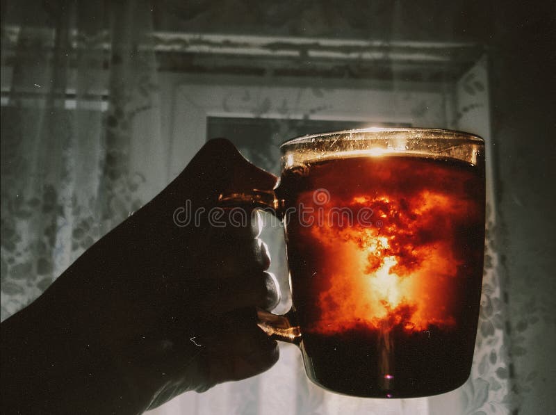 A Cup of tea through which the sun shines, Shining sun being caught in ...