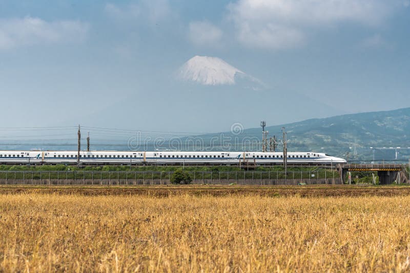 Shinkansen with Mountain Fuji in Back and Grass in Front Editorial ...