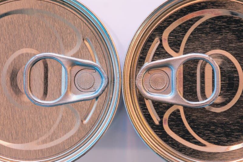 Shiny Aluminum Can Lids Facing Off in Close View Stock Image - Image of ...