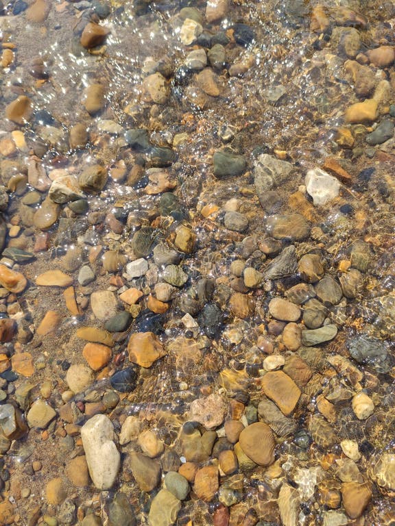 Shiny amazing river rocks stock photo. Image of water - 211611164