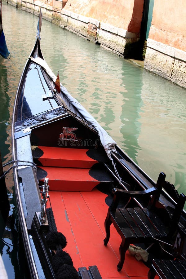Shiny Black and Red Gondola in Venetian Canal Stock Image - Image of ...