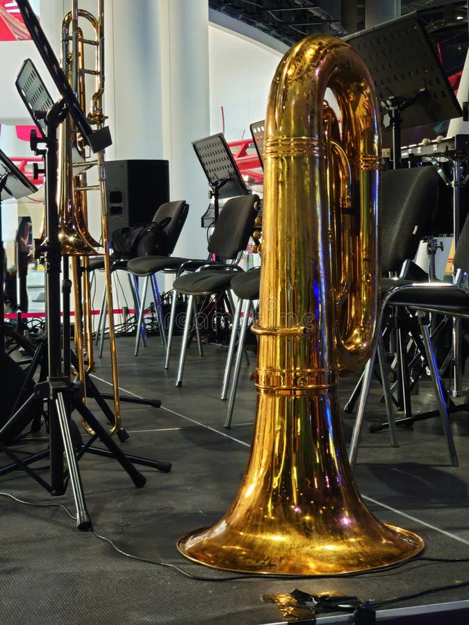 Shiny Brass Trombone Standing on a Stage Floor Editorial Stock Image ...