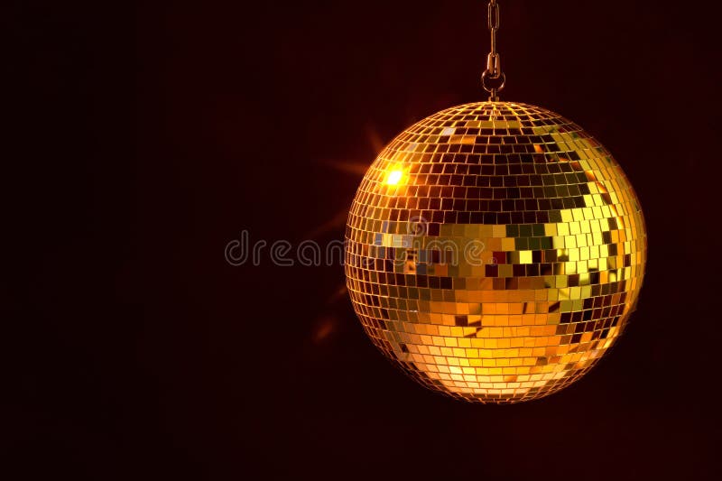 Shiny Bright Disco Ball Under Orange Light, Space for Text Stock Photo ...