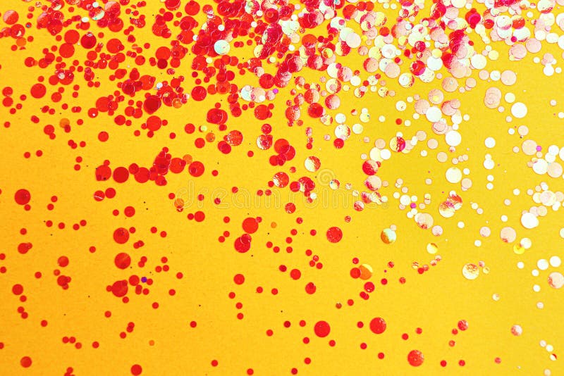 Shiny Bright Red Glitter on Yellow Background Stock Image - Image of ...