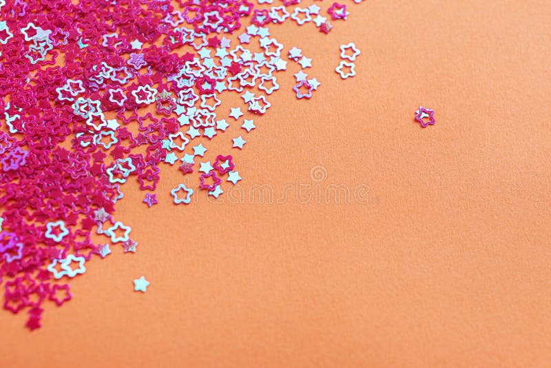Shiny Bright Star Shaped Glitter on Pale Coral Background. Space for ...