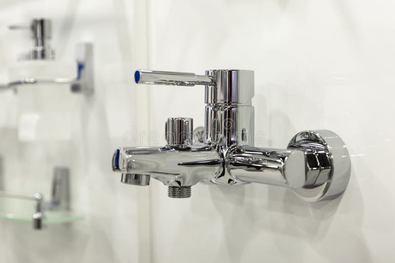 Shiny Chrome Faucet on the Wall. Design and Renovation Stock Image ...