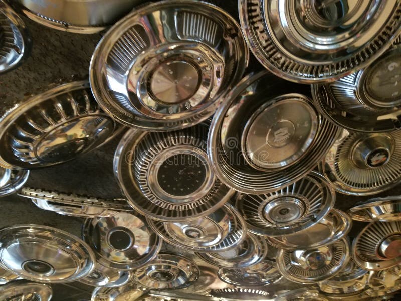 Shiny classic hubcaps editorial stock image. Image of dodge - 167299289
