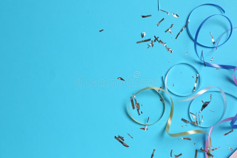 Shiny Confetti and Party Streamers on Light Blue Background, Flat Lay ...