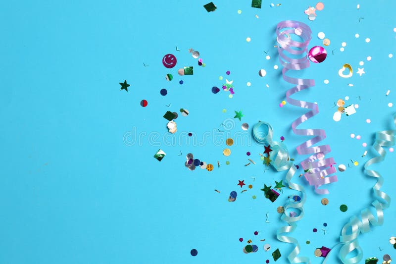 Shiny Confetti and Party Streamers on Light Blue Background, Flat Lay ...