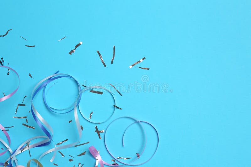 Shiny Confetti and Party Streamers on Light Blue Background, Flat Lay ...