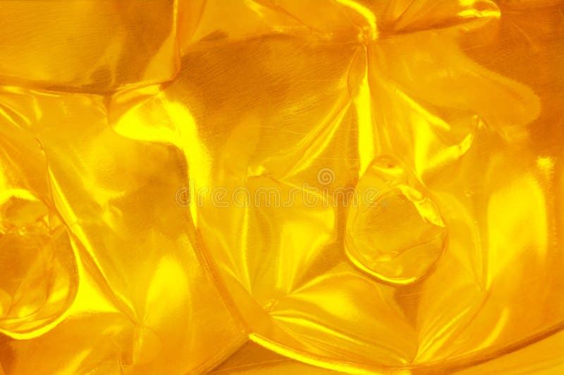 Shiny Crinkled Plastic Background in Glowing Shades of Yellow. Stock ...