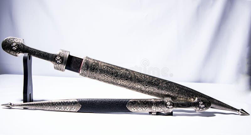 Shiny dagger in sheath stock image. Image of engraving - 132324425
