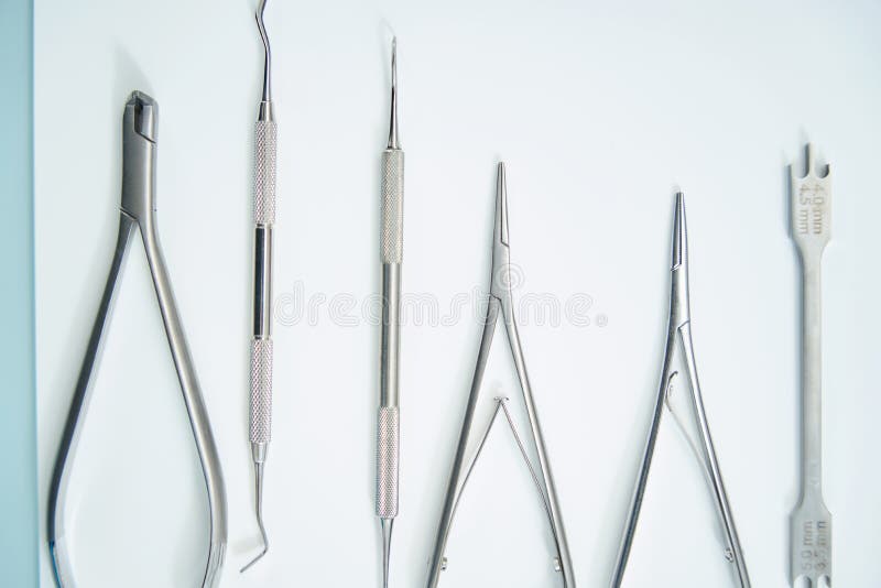 Shiny Dental Metal Instruments Lie on a Light Surface Stock Photo ...
