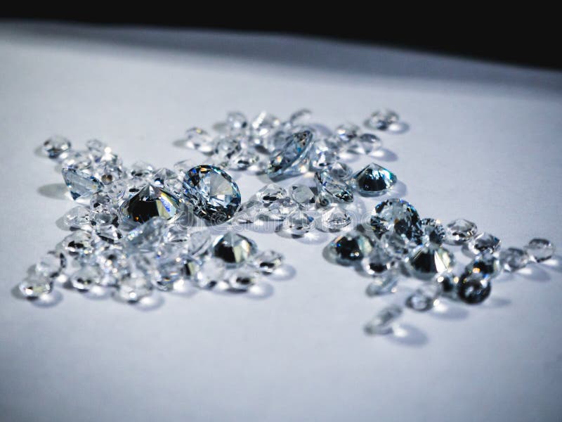 Shiny Diamonds Stones Laying on White Table Stock Image - Image of ...