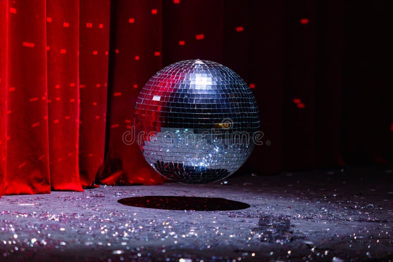 Shiny Disco Ball on a Stage with Red Curtain Stock Photo - Image of ...