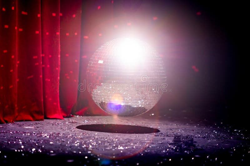 Shiny Disco Ball on a Stage with Red Curtain Stock Image - Image of ...