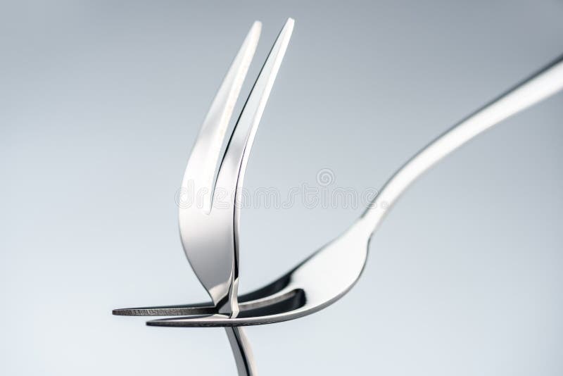 Shiny forks with two tines stock photo. Image of metal - 120916620