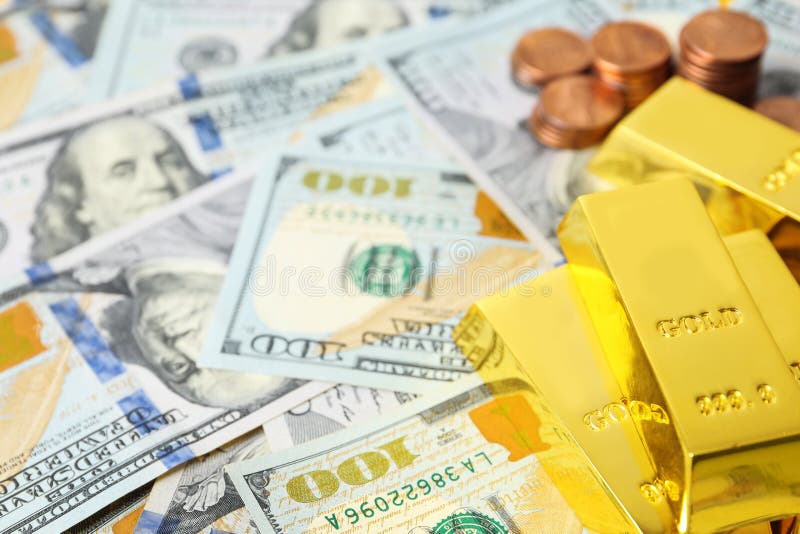 Shiny Gold Bars and Coins on Dollar Bills. Stock Image - Image of ...