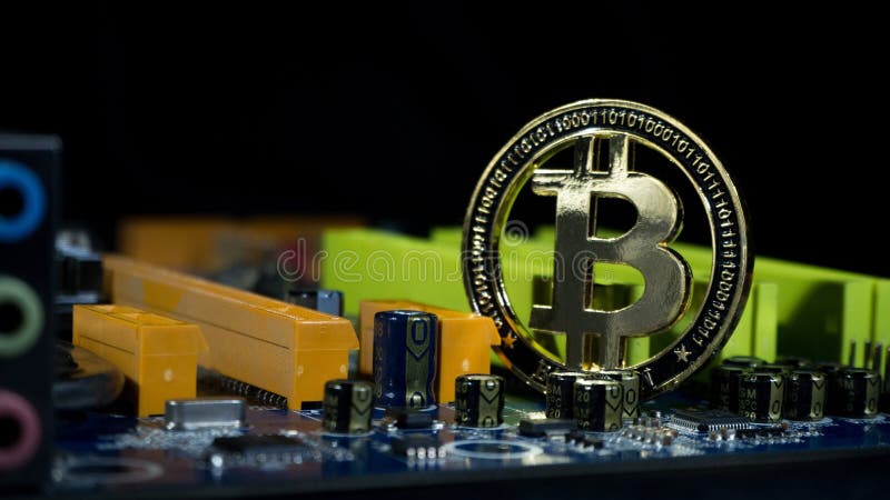 Shiny Gold Bitcoin Virtual Crypto Currency Coin Laying on Electronic ... Shiny Gold Bitcoin Virtual Crypto Currency Coin Laying on Electronic ...