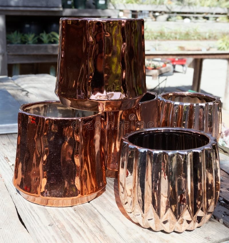 Shiny Garden Planters stock photo. Image of cache, gold - 118149050