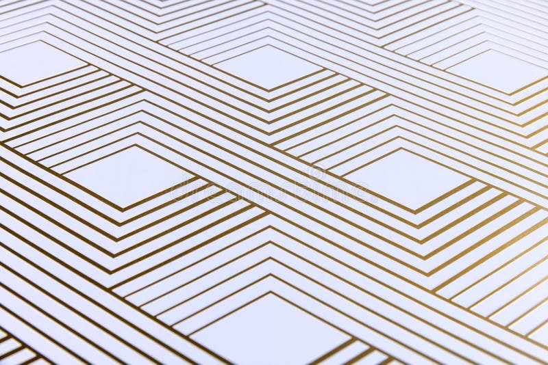 Shiny Gold Geometric Lines on White Paper from an Angle Stock Photo ...
