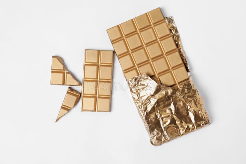 Shiny Golden Chocolate Bar with Foil on White Background, Top View ...