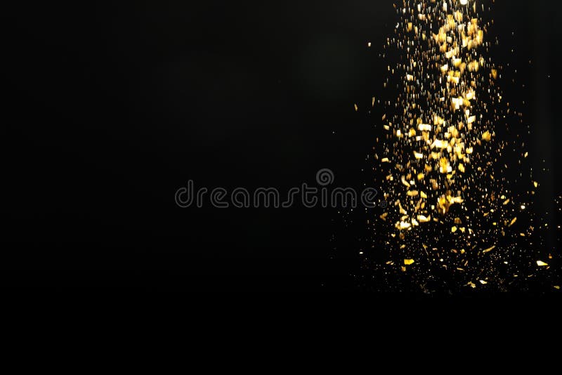 Shiny Golden Glitter Falling Down on Black Background, Space for Text ...